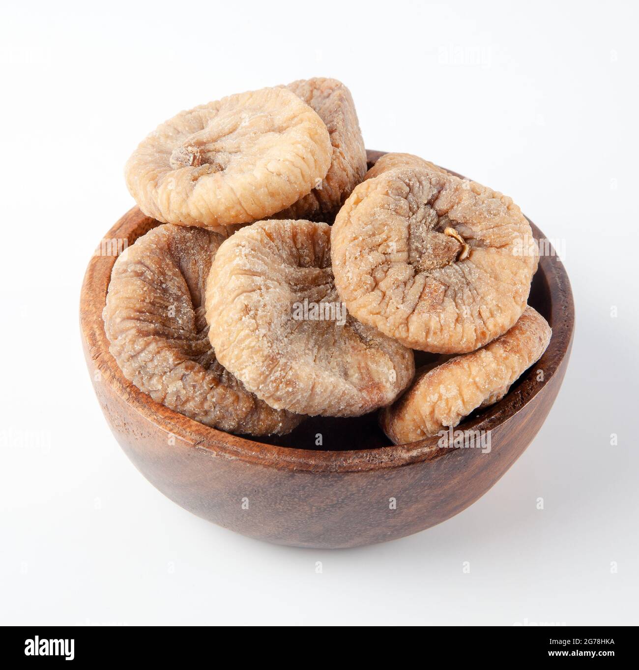 Organic dried figs in bowl.On white background Stock Photo - Alamy