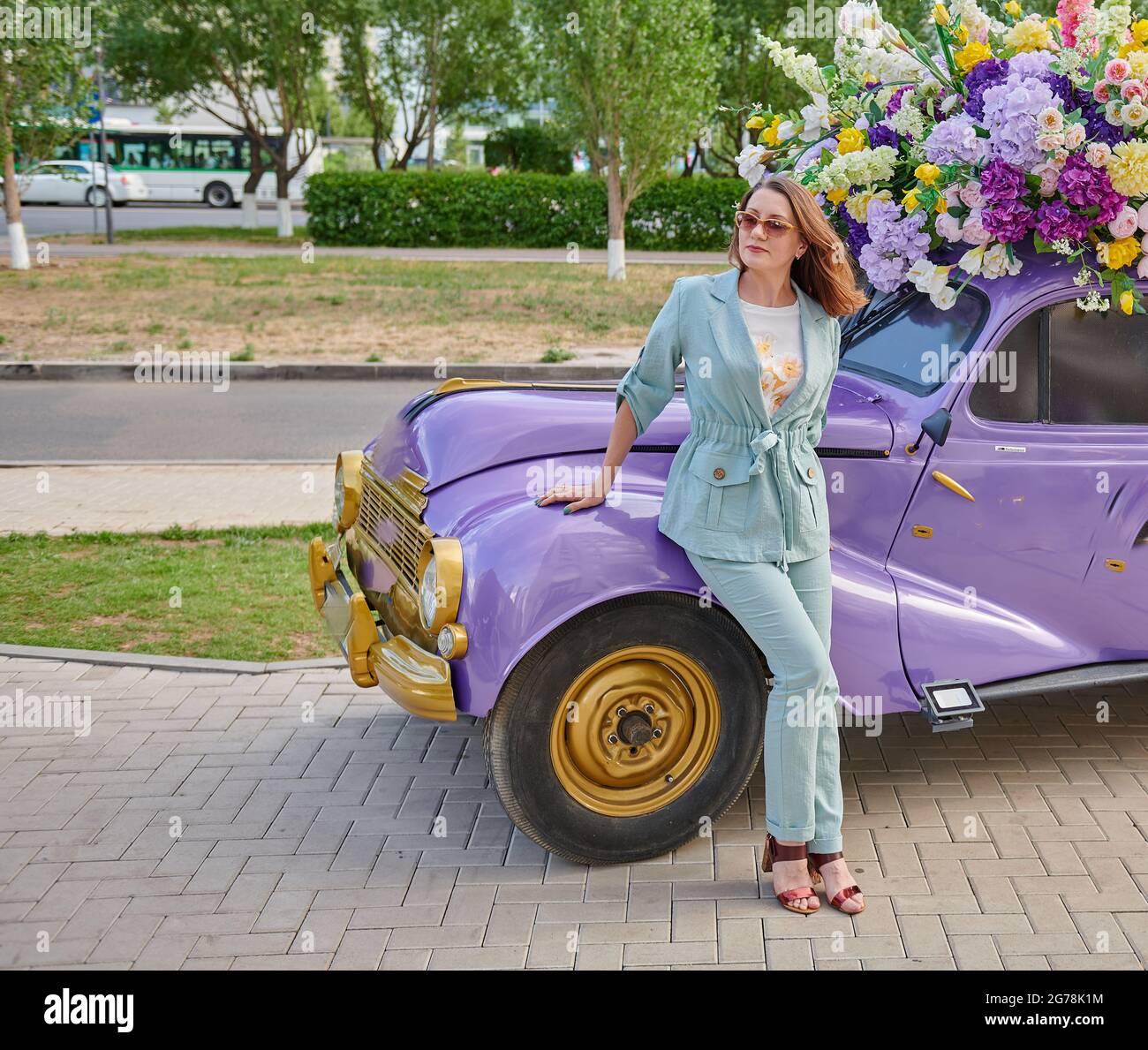 violet car with different colors on the roof Stock Photo - Alamy