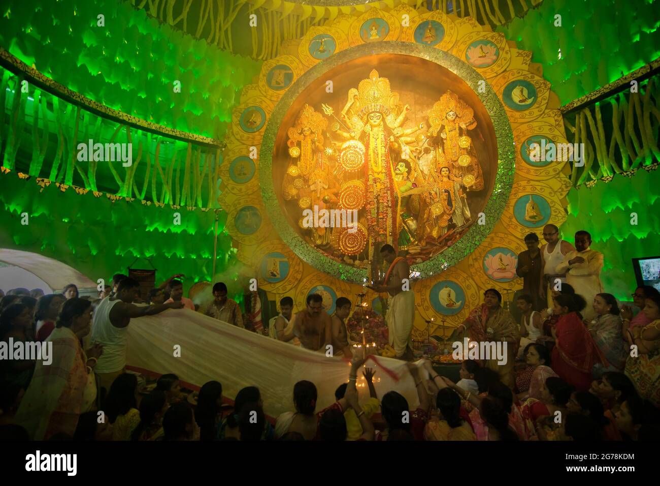 KOLKATA , INDIA - OCTOBER 2, 2014 : Priests carrying Sari (Hindu dress ...