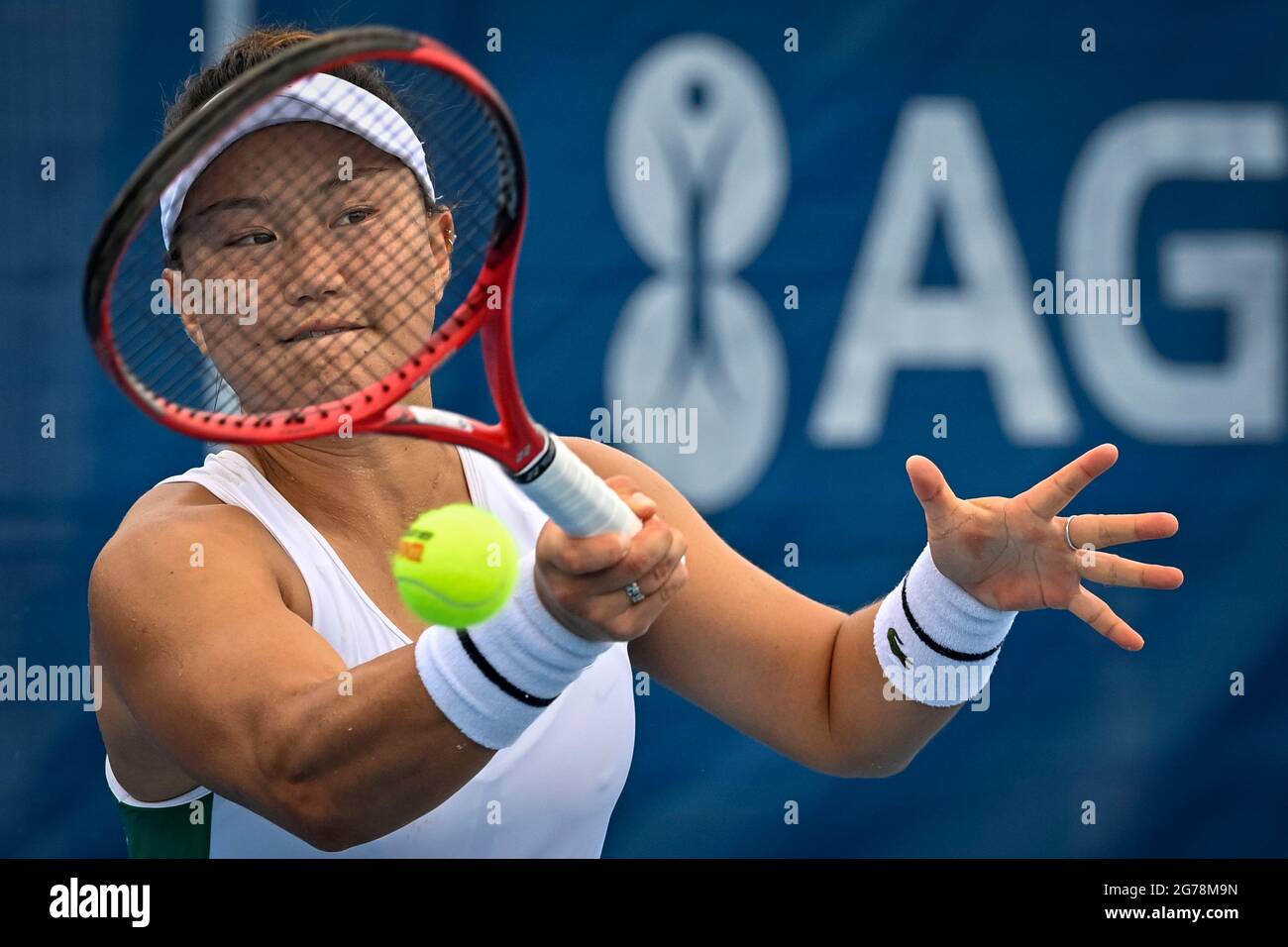 Grace Min (USA) in action against Samantha Stosur (Australia) during ...
