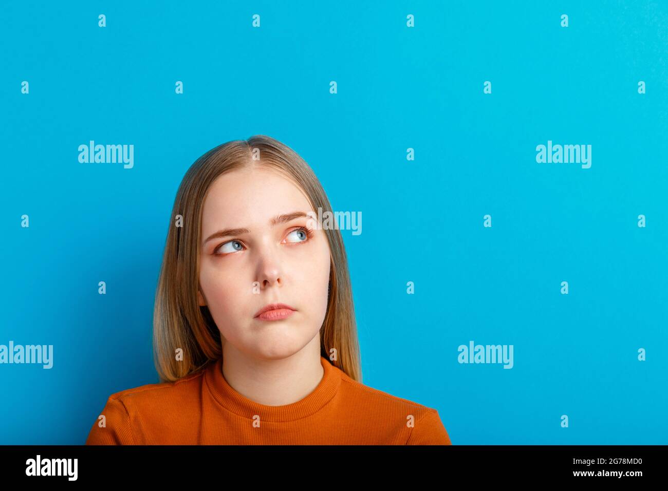 Confused emotional portrait of doubt teenage girl with question looking ...