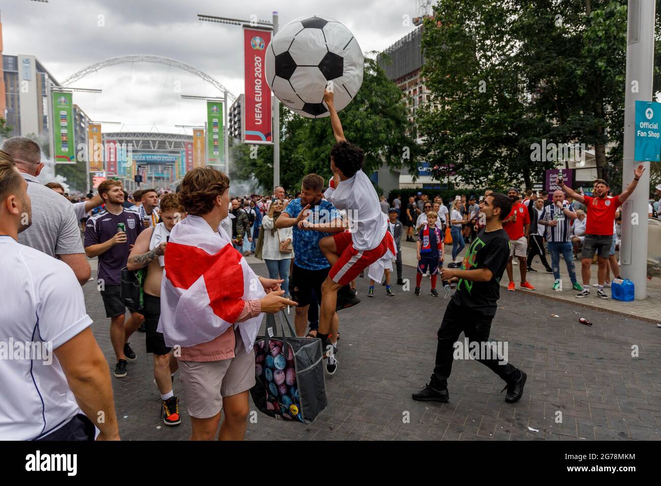London, UK. 11th July, 2021. England fans play with a giant inflatable ...