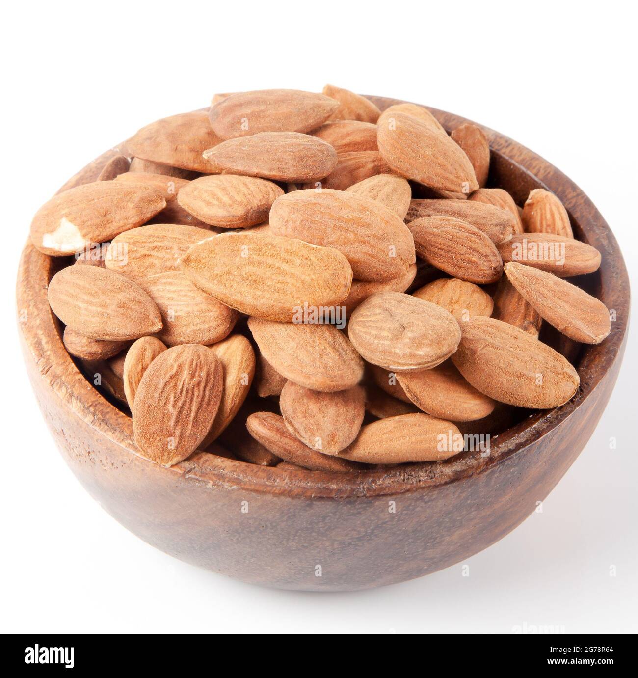 Almonds in bowl.On white background Stock Photo - Alamy