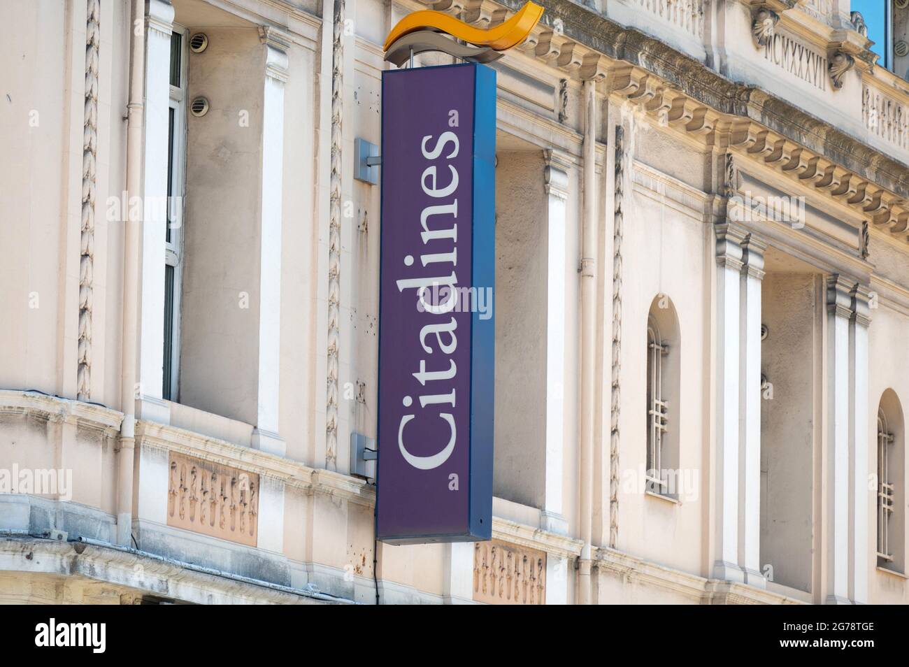 A shop sign of Citadines hotel,on July 12, 2021 in Cannes, France ...
