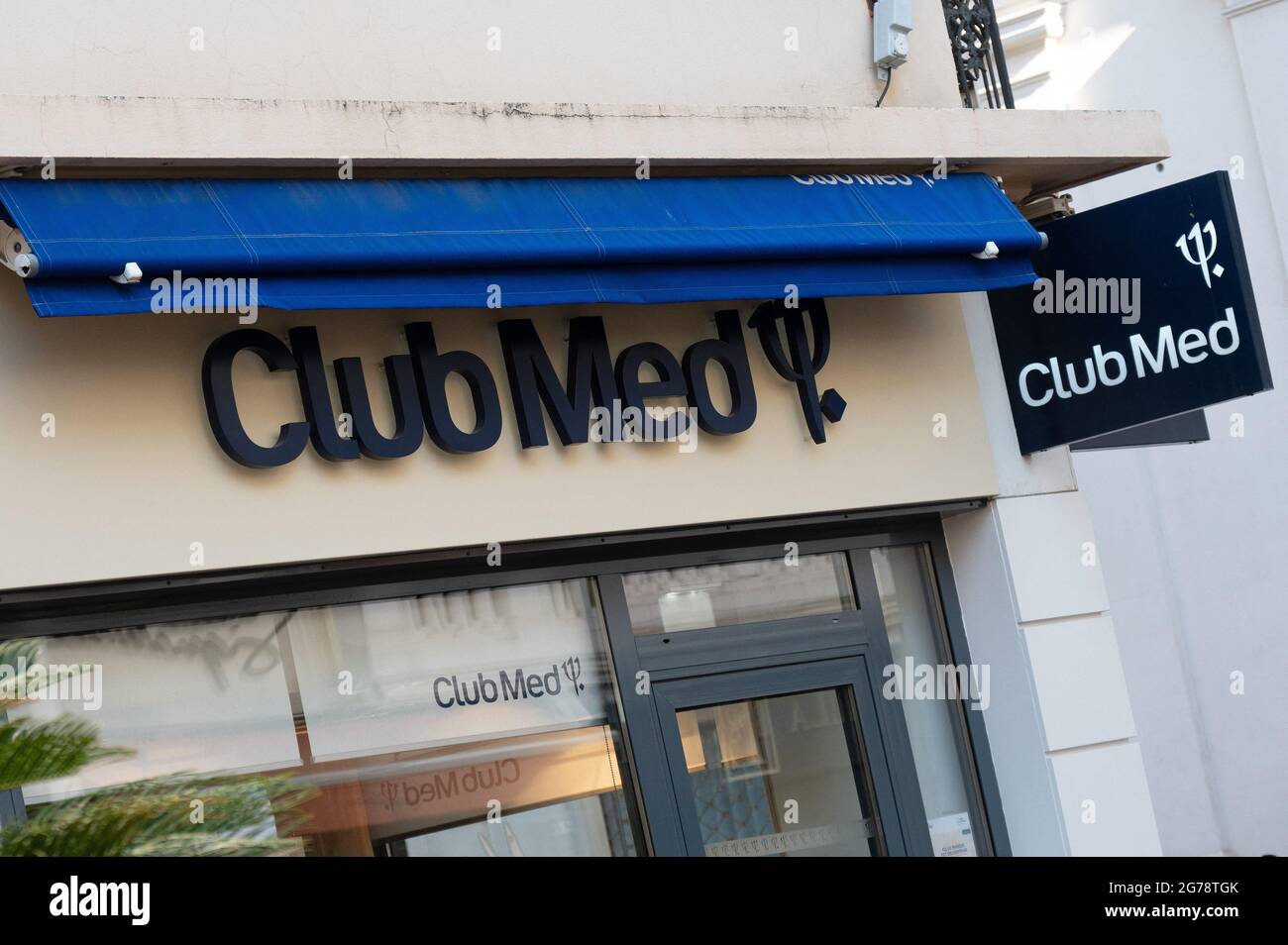 A shop sign of Club Med,on July 12, 2021 in Cannes, France. Photo by ...