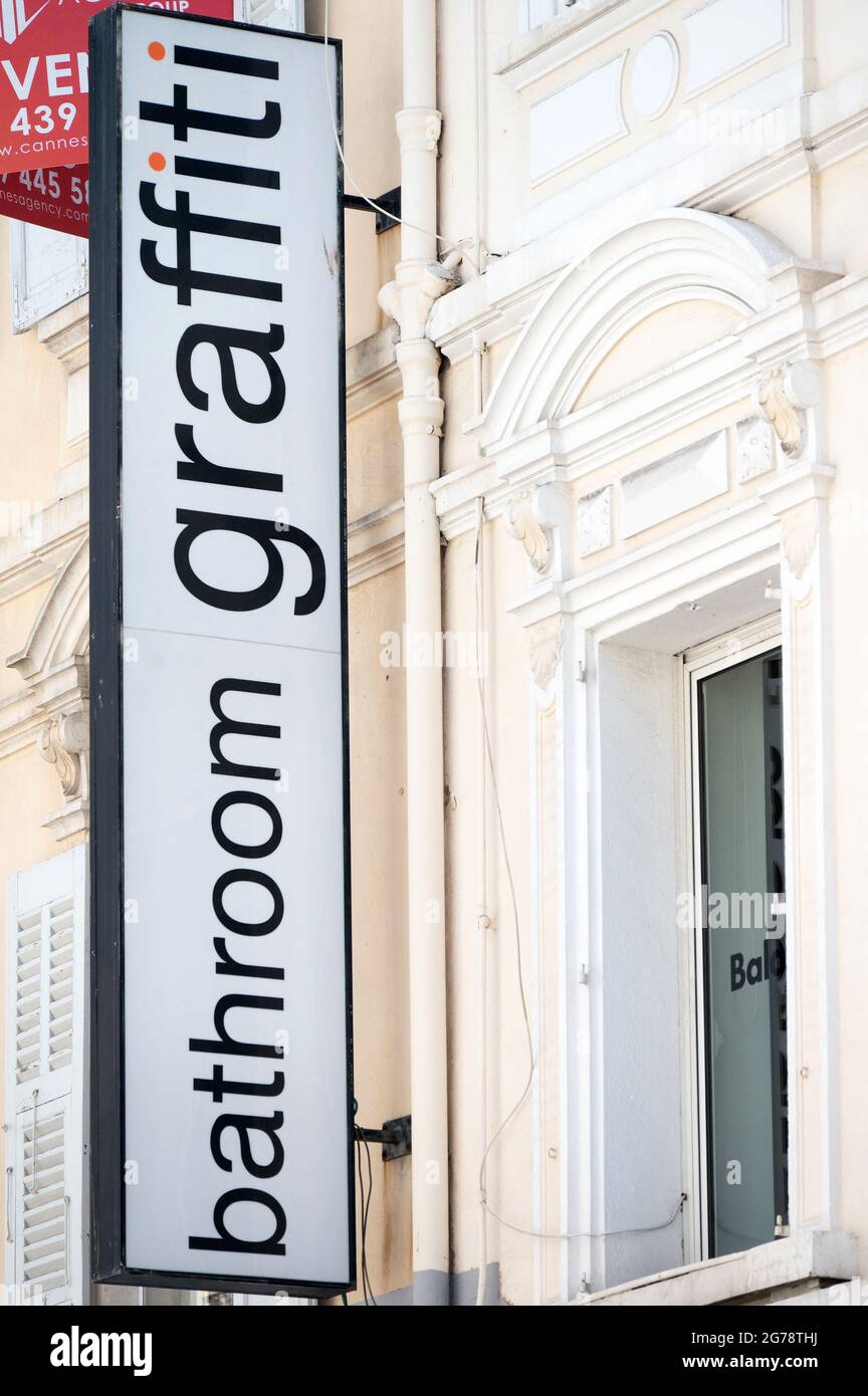 A shop sign of Bathroom Graffiti,on July 12, 2021 in Cannes, France ...