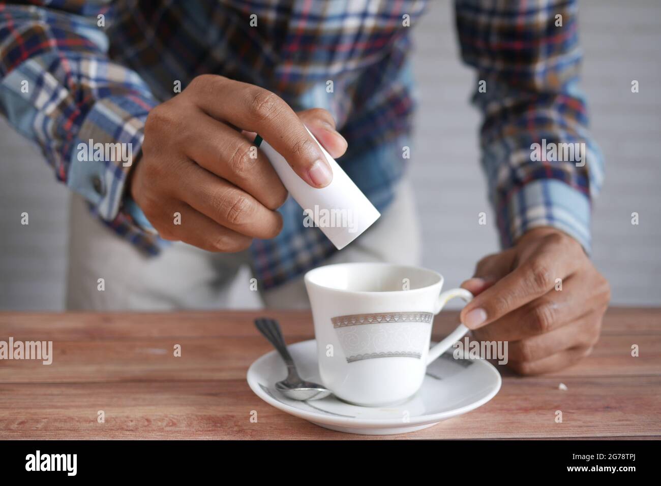 Putting sugar in tea hi-res stock photography and images - Alamy