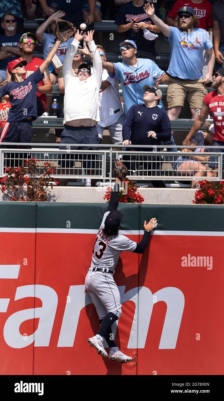Detroit Tigers left fielder Eric Haase (13) watches a Minnesota Twins ...