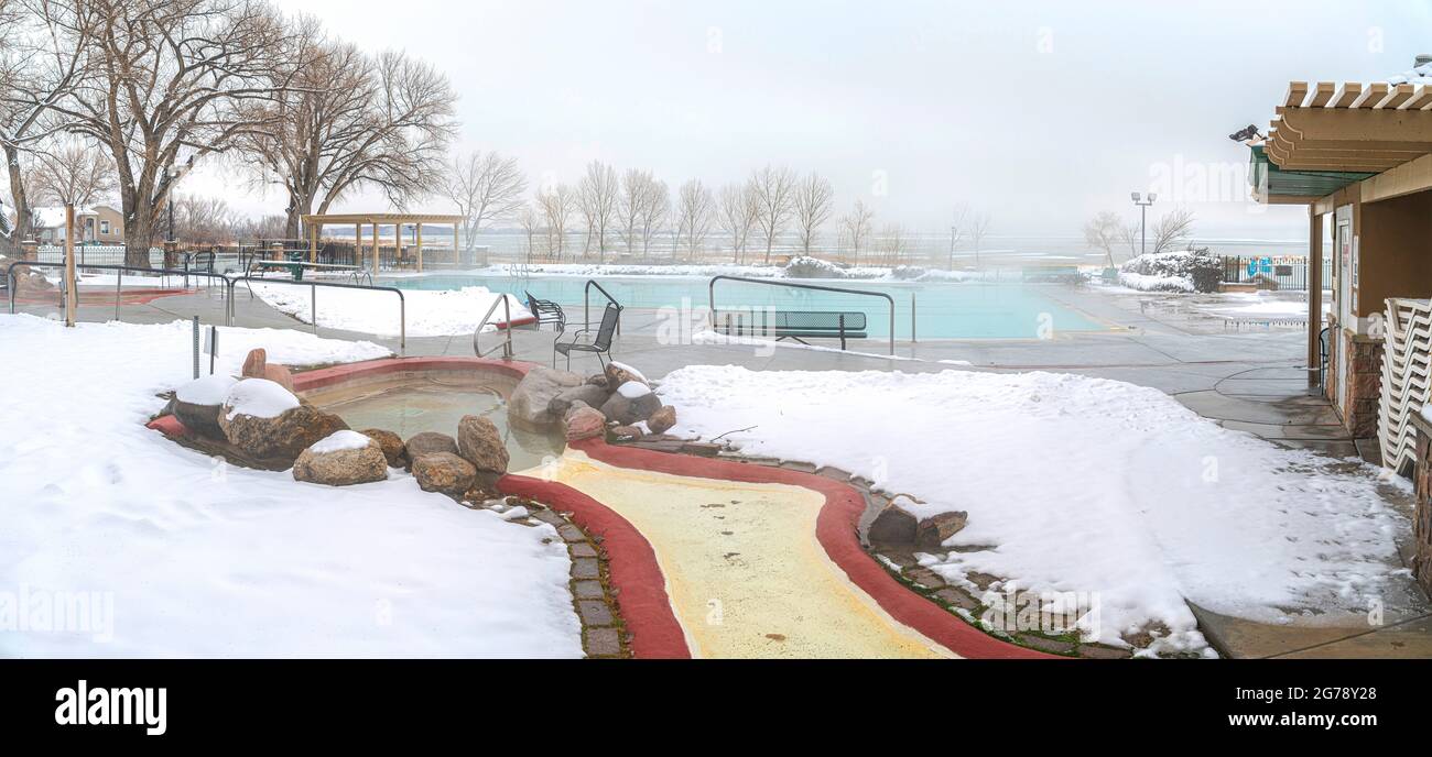 Small and large outdoor pools in the middle of snow Stock Photo - Alamy