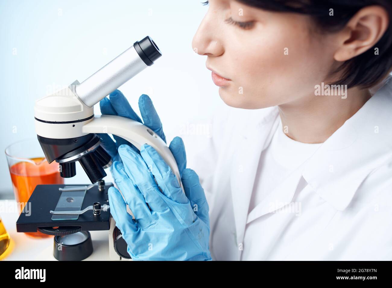 female laboratory assistant chemical solution research work science ...