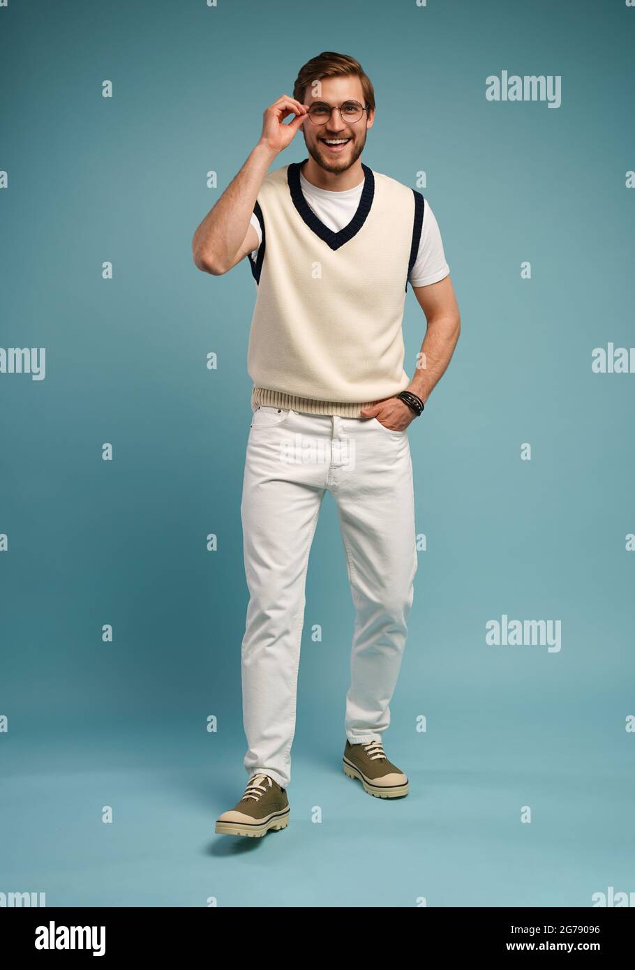 Full length body size photo of cheerful charming cute handsome man ...
