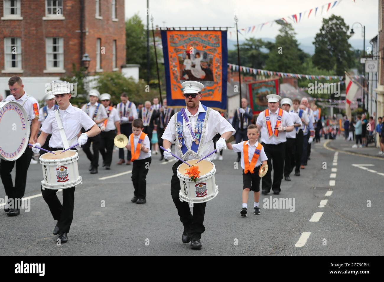 The Orange Order parade in the village of Hillsborough, Co.Down, as ...