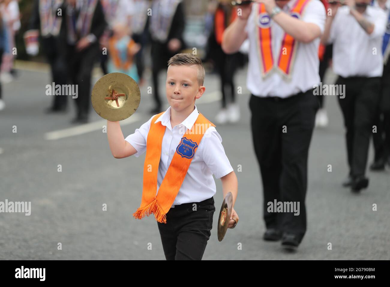 The Orange Order parade in the village of Hillsborough, Co.Down, as ...