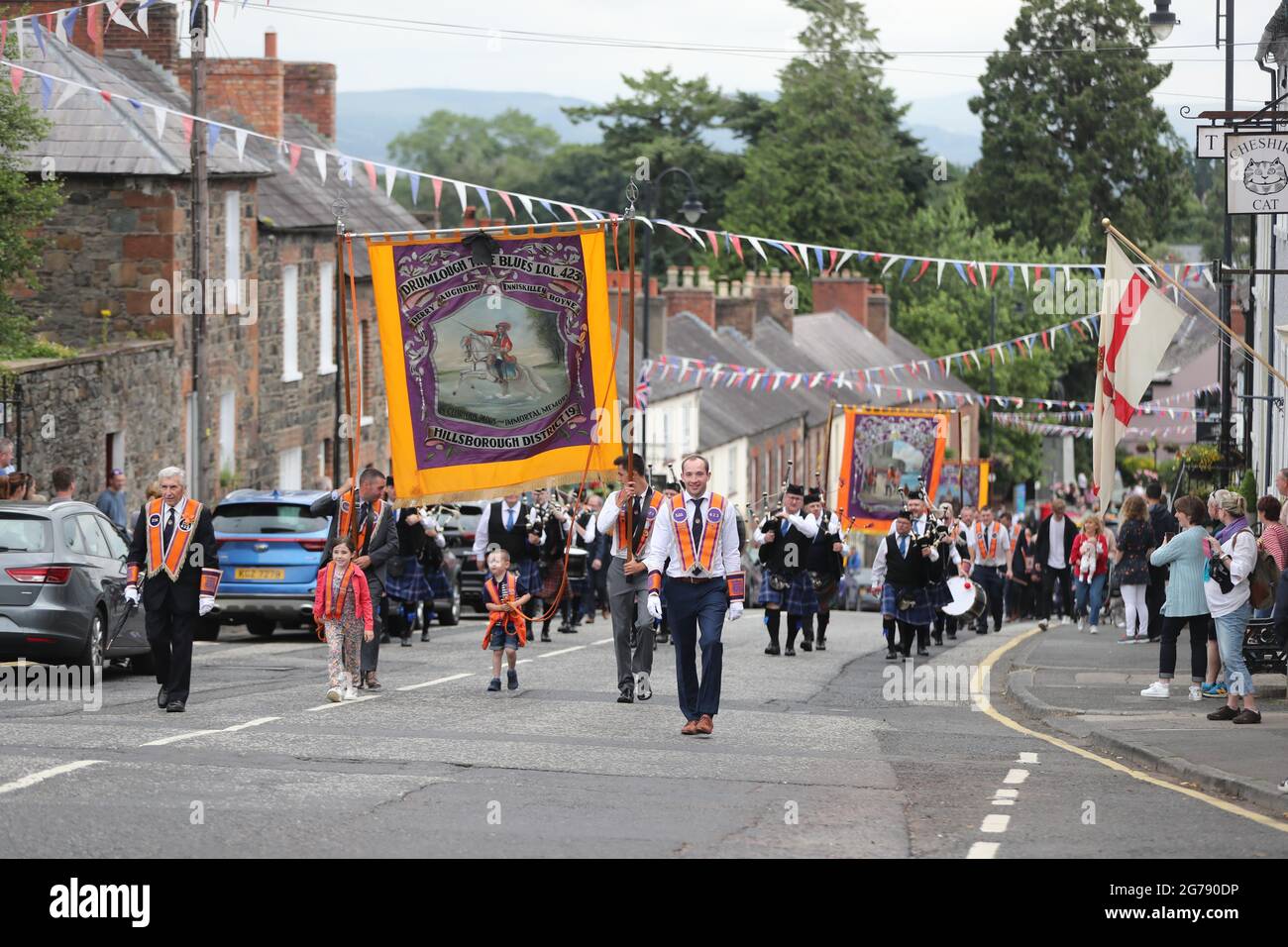The Orange Order parade in the village of Hillsborough, Co.Down, as ...