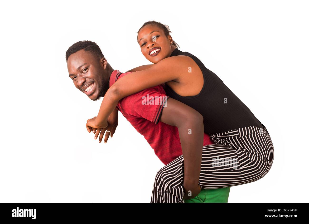 Charming girl enjoys life and love on the back of her boyfriend inside ...