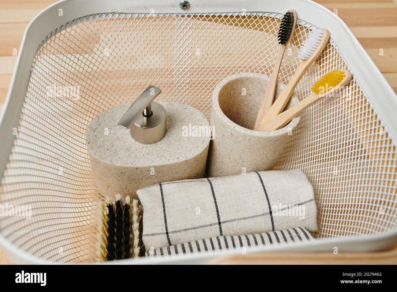 Eco friendly toothbrushes and other bodycare items inside basket Stock ...
