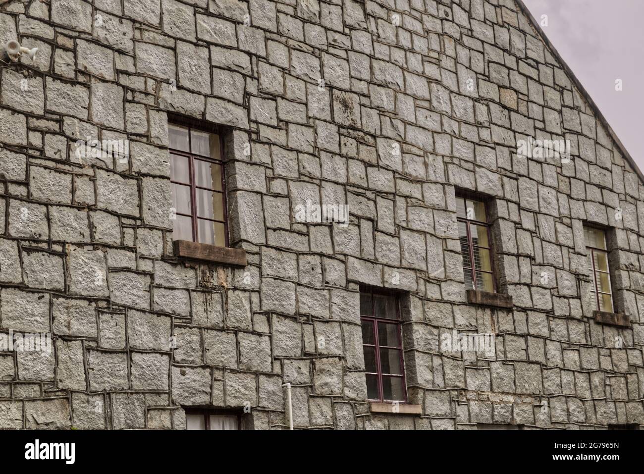 Close up beautiful Vintage old stone wall and rustic windows background ...