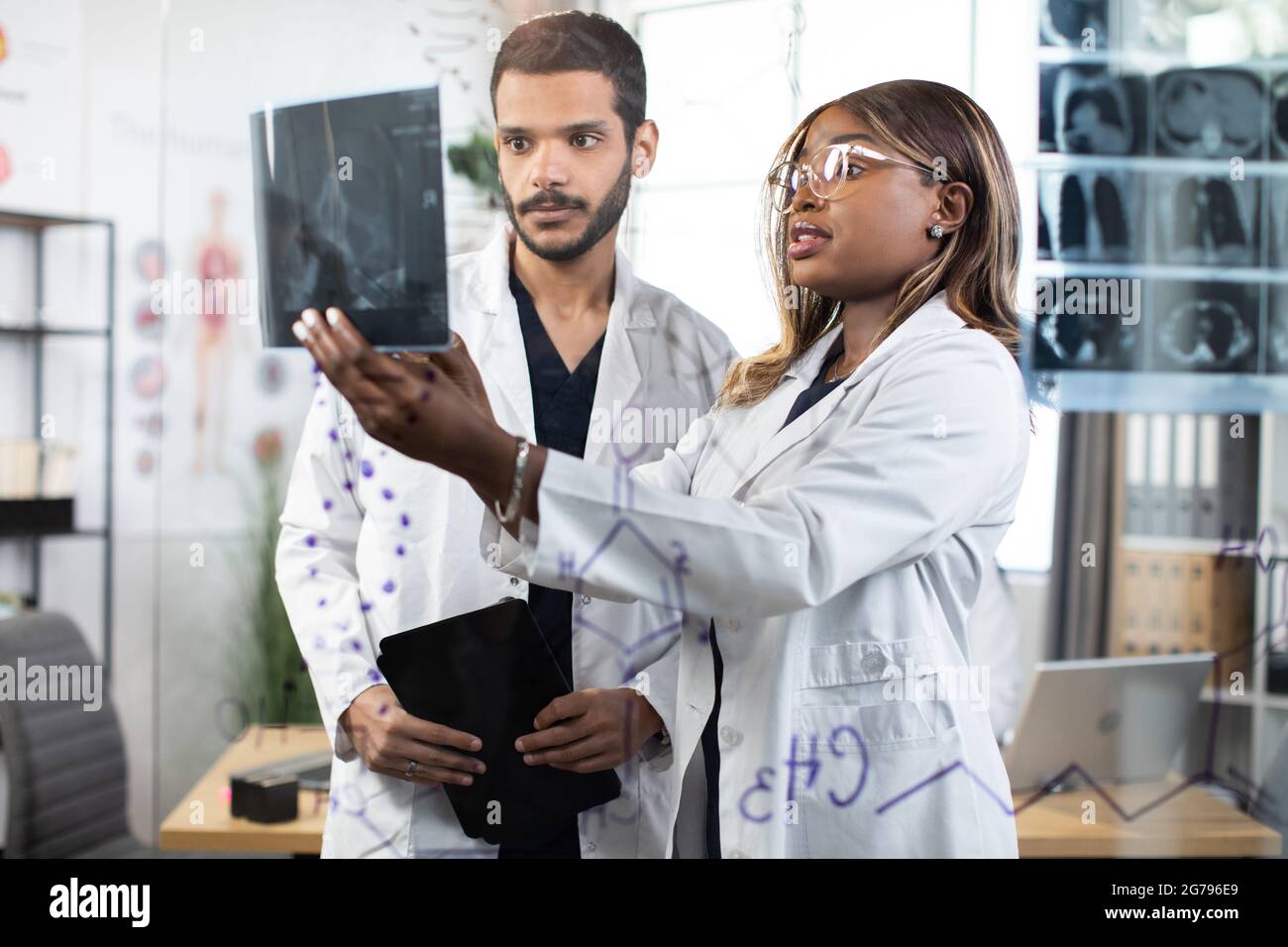 Scientists in research lab behind hi-res stock photography and images ...