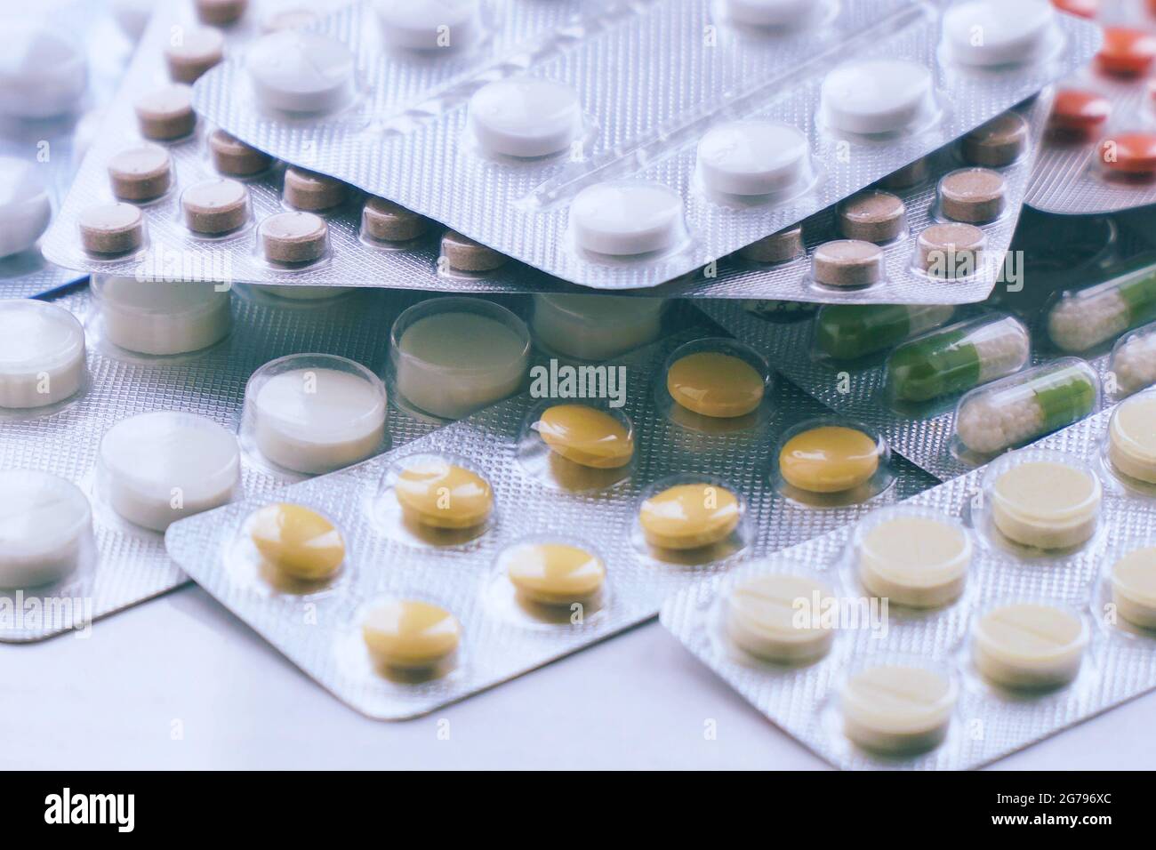 Overall view of pharmaceutical tablets and capsules in packages in ...