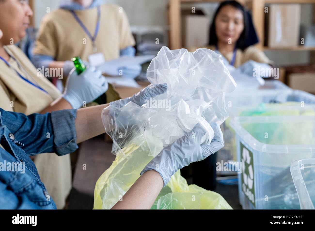 Woman sorting material hi-res stock photography and images - Alamy