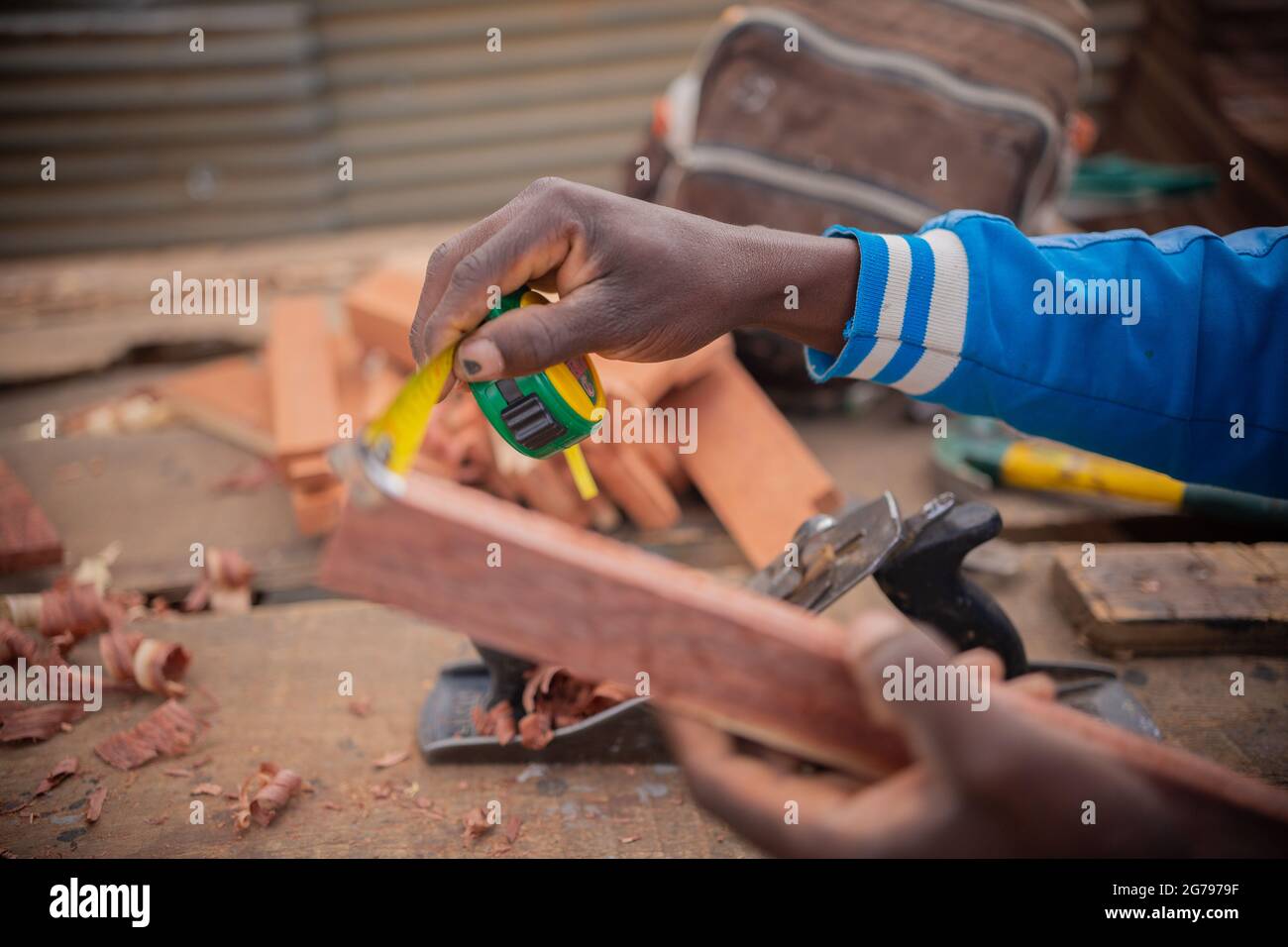Zambian carpenter, woodworking man, African man Working with his hands ...