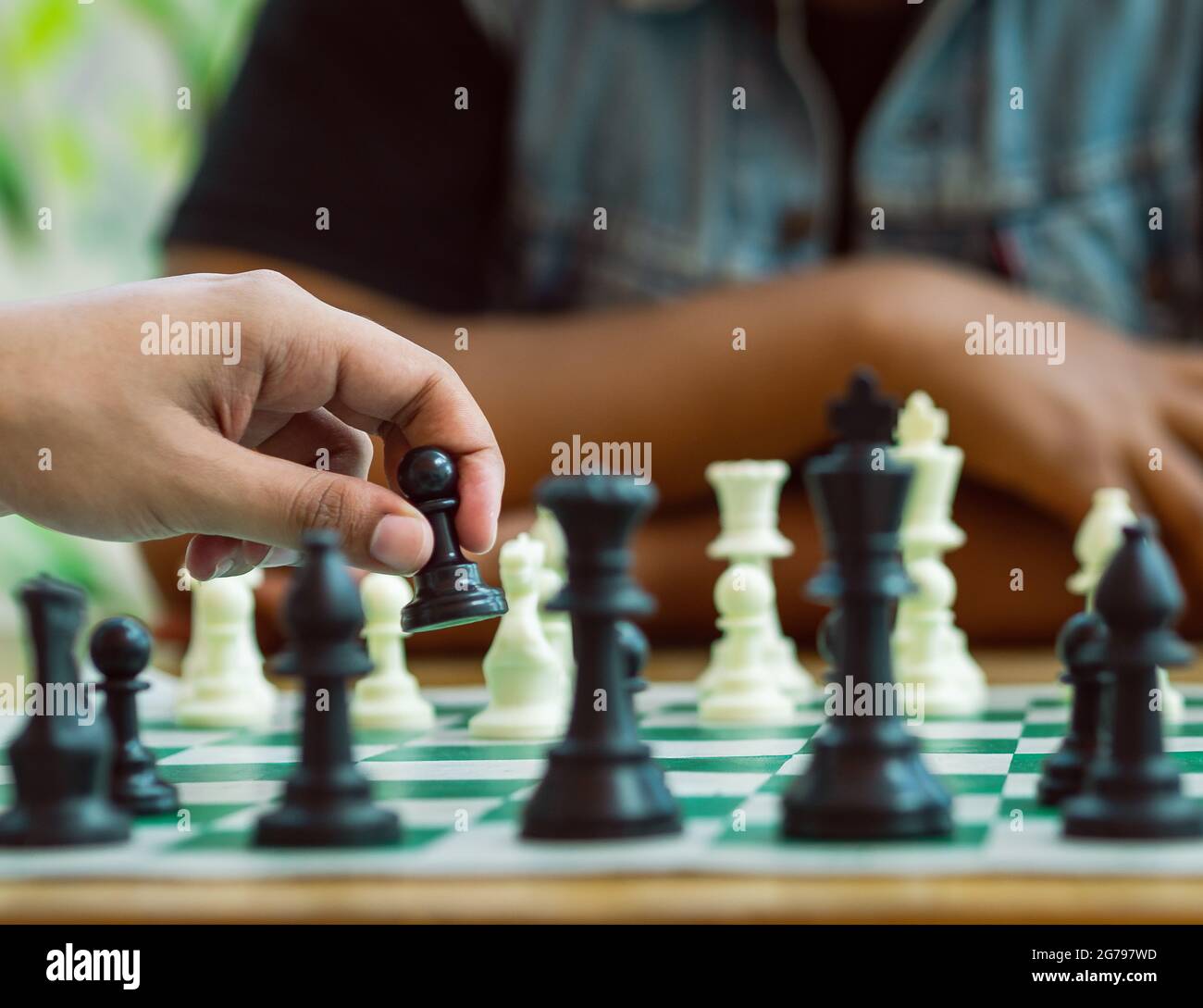 Hand holding chess pawn on hi-res stock photography and images - Alamy