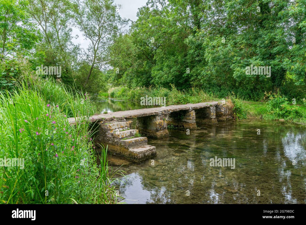 Flagstone bridge over the river leach hi-res stock photography and ...