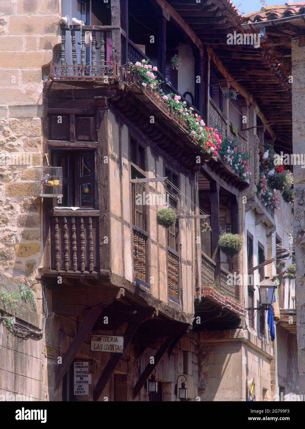 BALCONES DE MADERA CON FLORES. Location: EXTERIOR. SANTILLANA DEL MAR ...