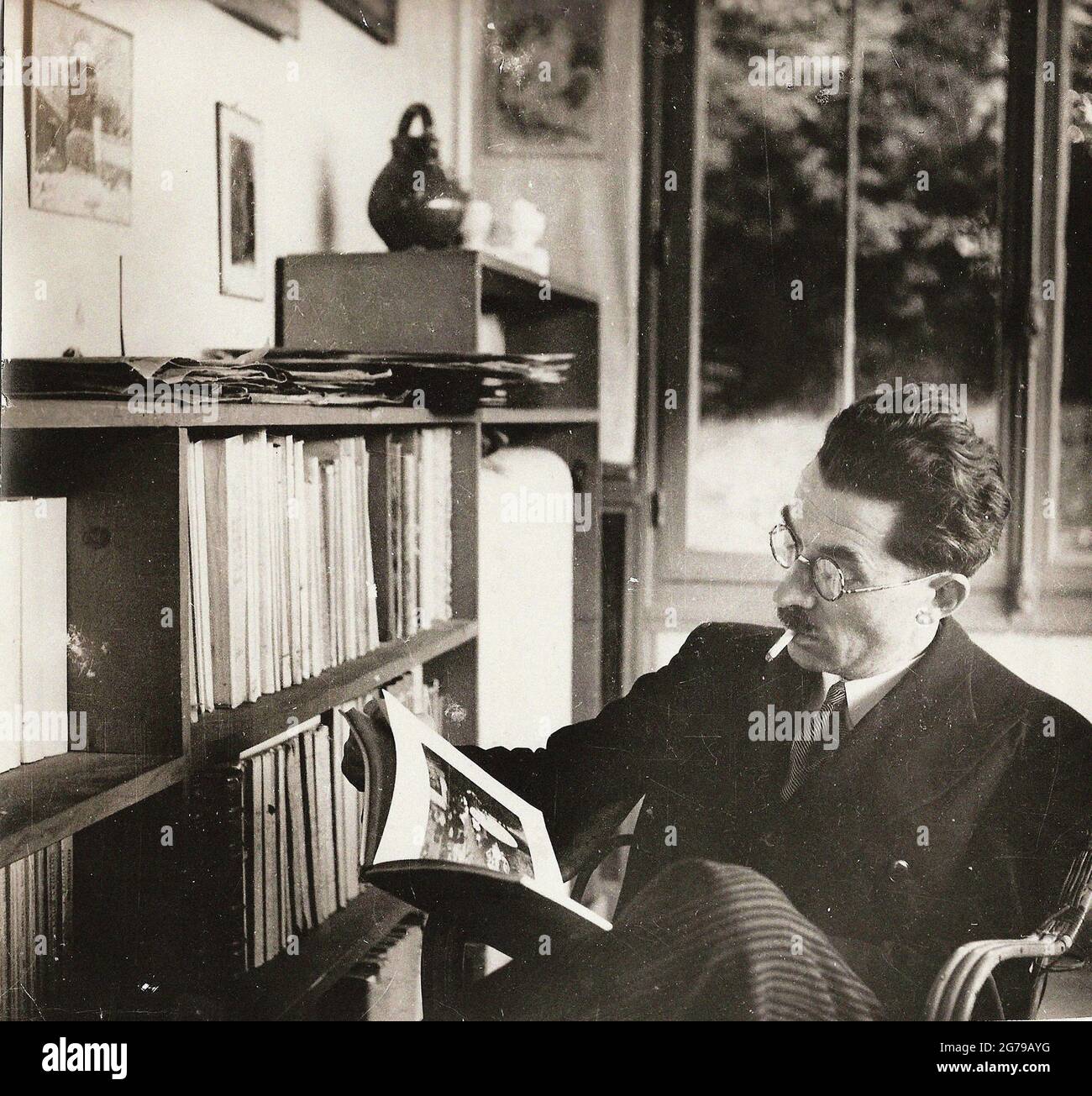 Daniel Jacomet (1894-1966) in his library in Pontoise. Museum: PRIVATE ...
