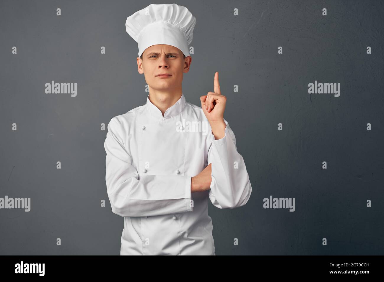 male chef in professional uniform work restaurant Stock Photo - Alamy