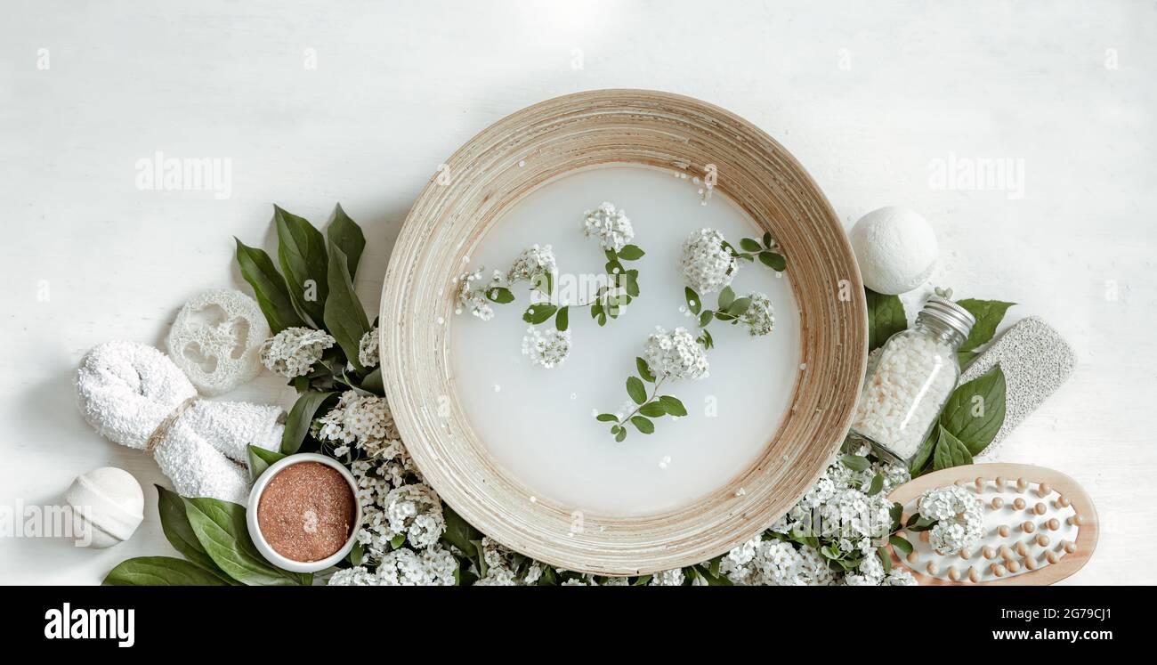 Spa composition with soapy water and beauty and body care products ...
