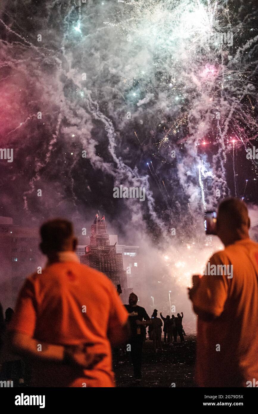 Belfast, UK. 11th July, 2021. Spectators watch the fireworks display ...
