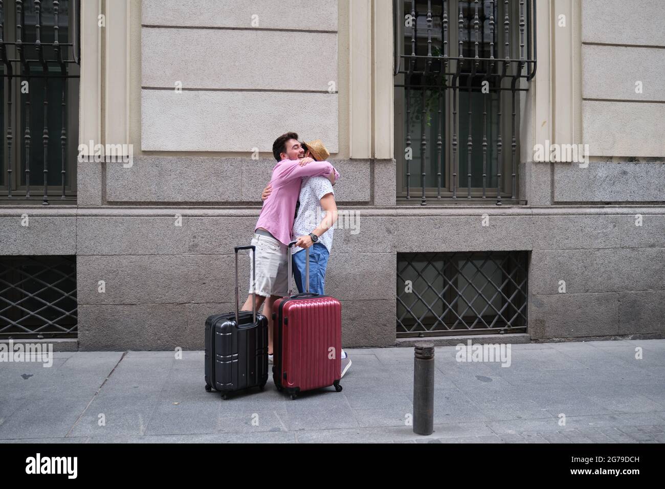 Two people hugging hi-res stock photography and images - Alamy