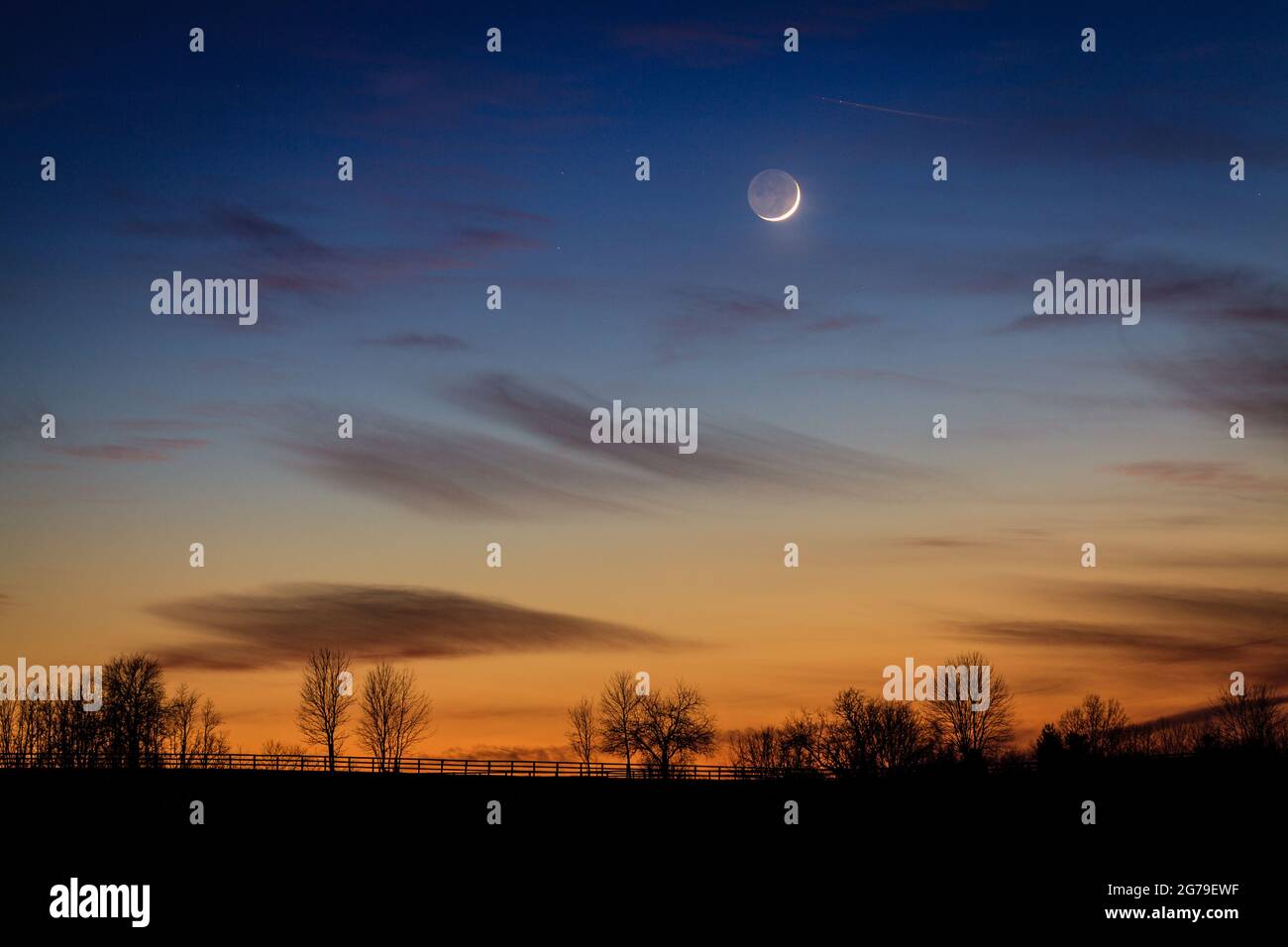 Scenic view of young crescent moon over rural Kentucky Stock Photo - Alamy