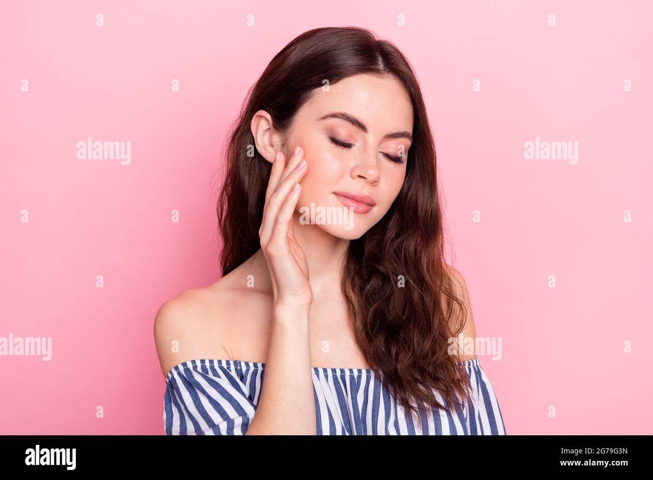 Photo of nice optimistic brunette lady hand cheek wear blue dress ...