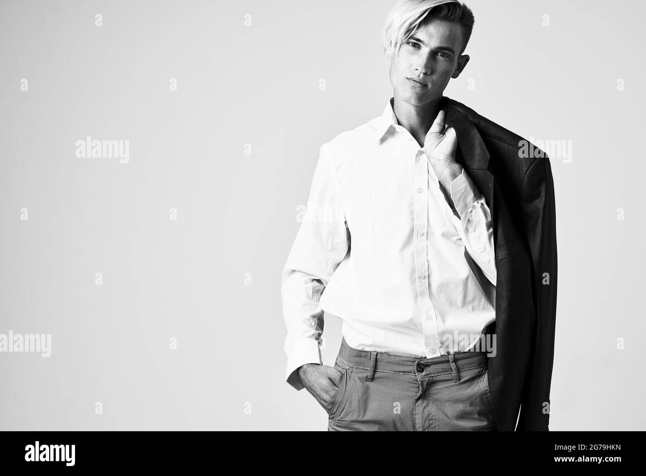 man in white shirt jacket fashion self confidence posing Stock Photo ...