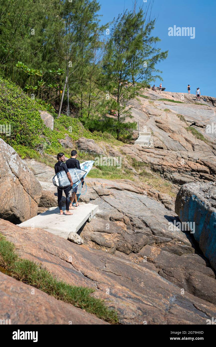 Surfers heading to the next Surf spot at the incredible beautiful and ...