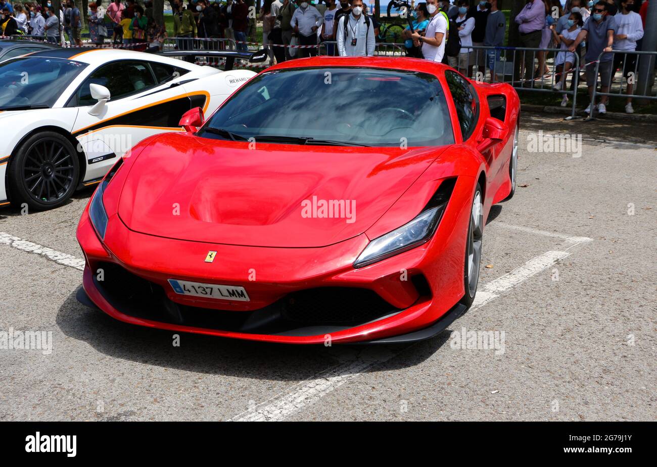 Red Ferrari F8 Tributo car parked at a Super car day public event ...