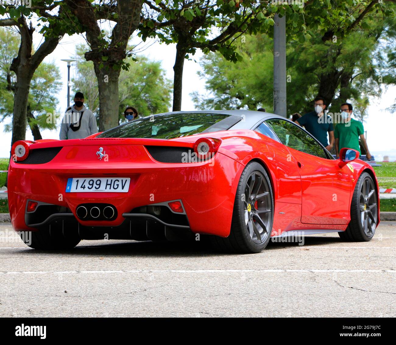 Rear view of a red Ferrari 458 Italia car parked at a Super car day ...