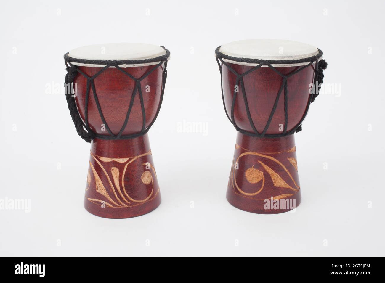 A pair of handmade wooden African hand drums Stock Photo - Alamy