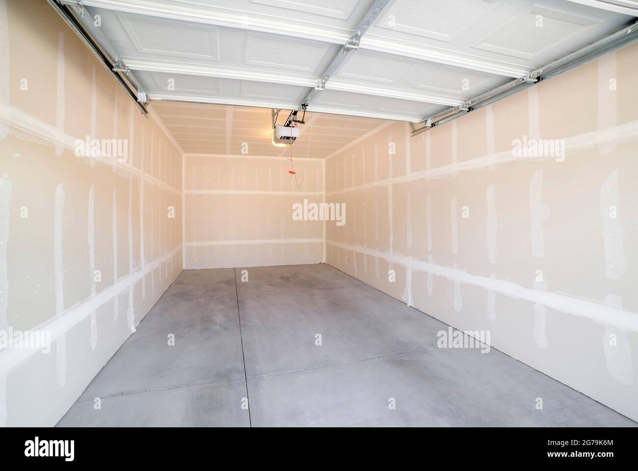 Interior of a detached garage with open automatic single door Stock ...