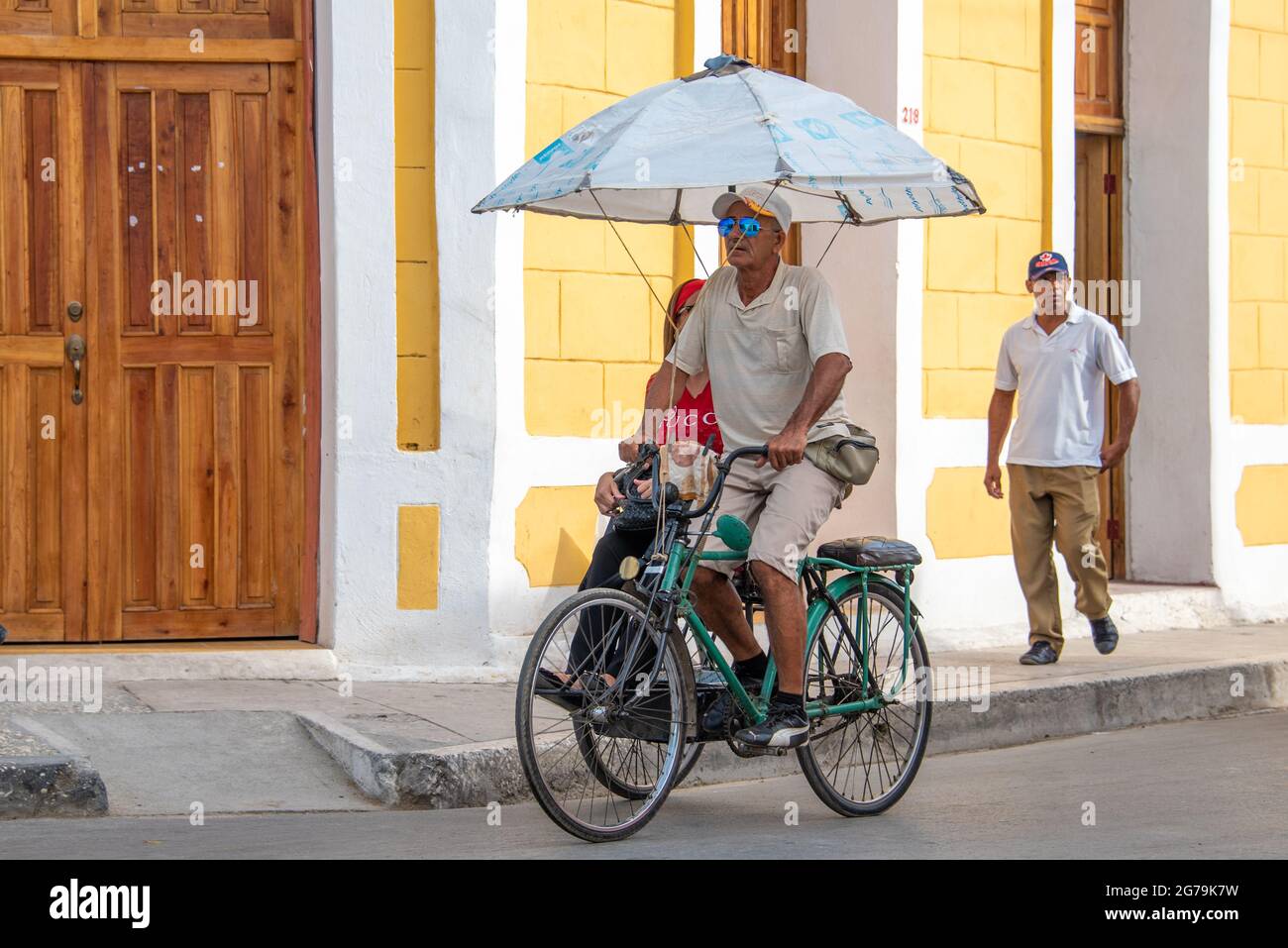 Cuban people in bicitaxi, Holguin, Cuba, Nov. 2016 Stock Photo - Alamy