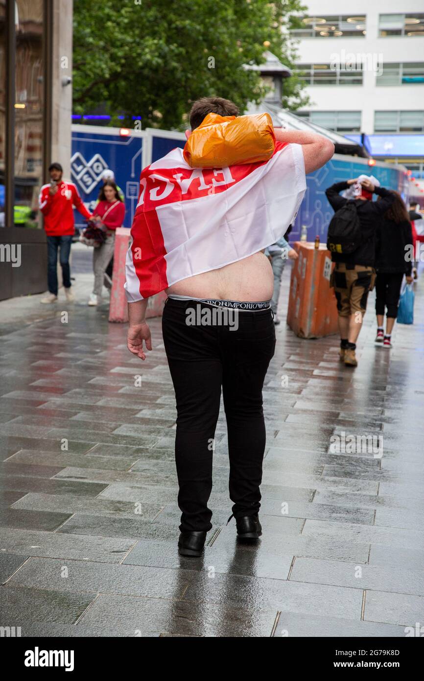 A football supporter with his bum hanging out on his way to the Euro ...