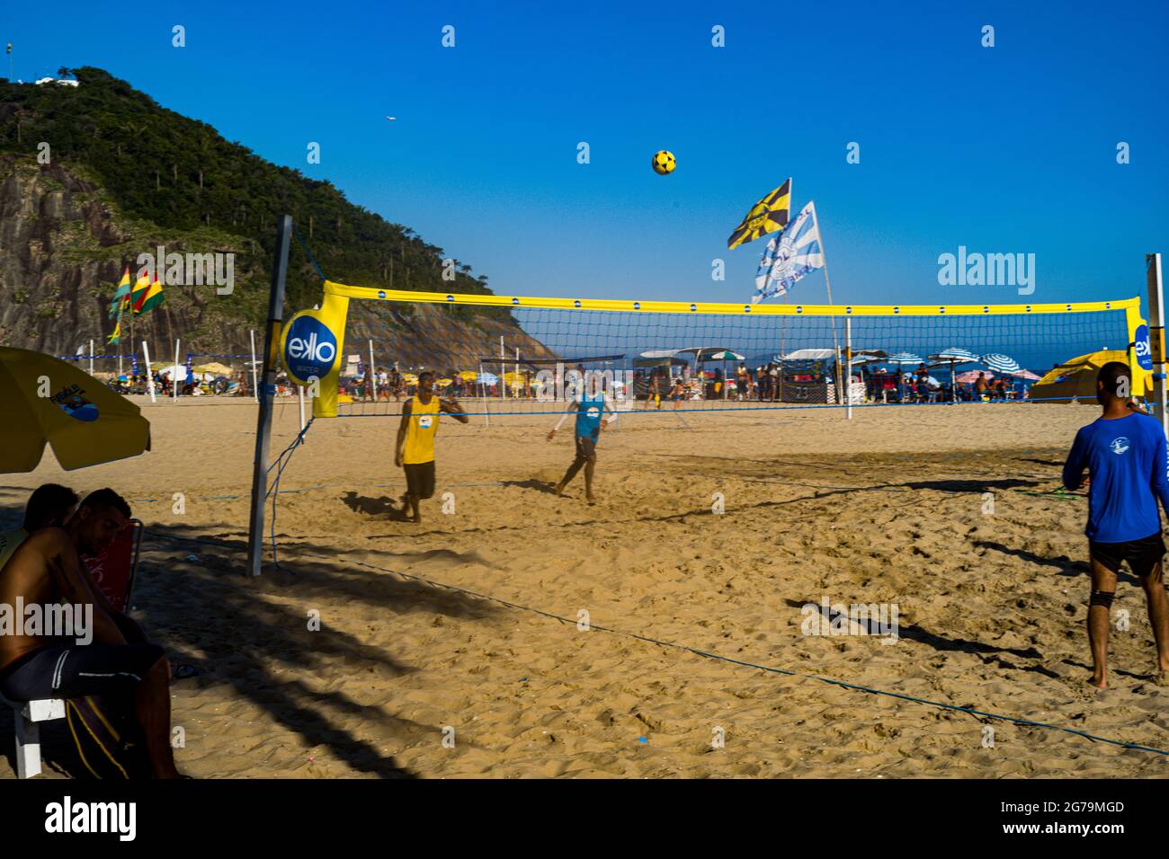 Brazilians playing futevolei (footvolley) on a sunny day at Ipanema ...