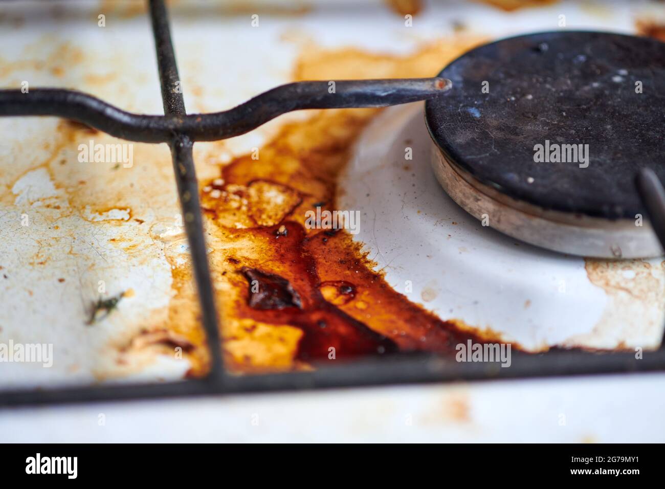 Dirty grease stove with food leftovers. Unclean gas kitchen cooktop ...