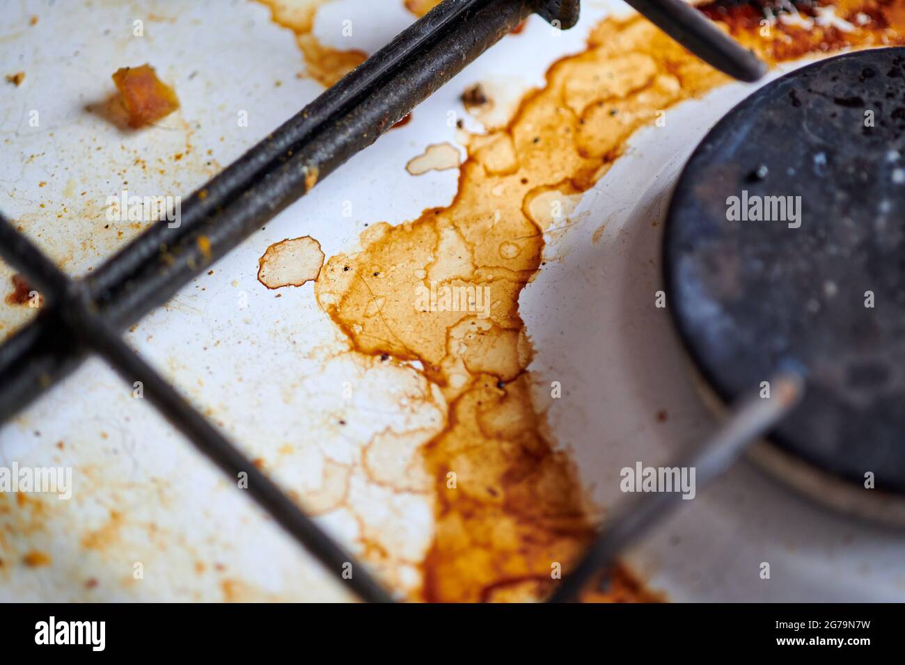 Dirty grease stove with food leftovers. Unclean gas kitchen cooktop ...