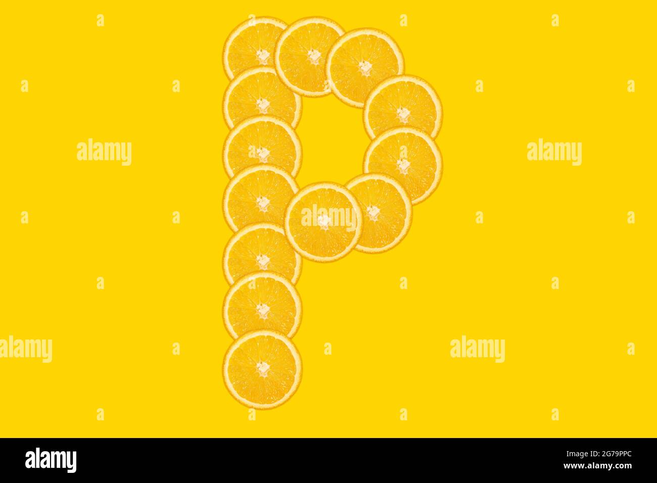 Sliced orange alphabet - letter P. Yellow background. Fresh healthy ...