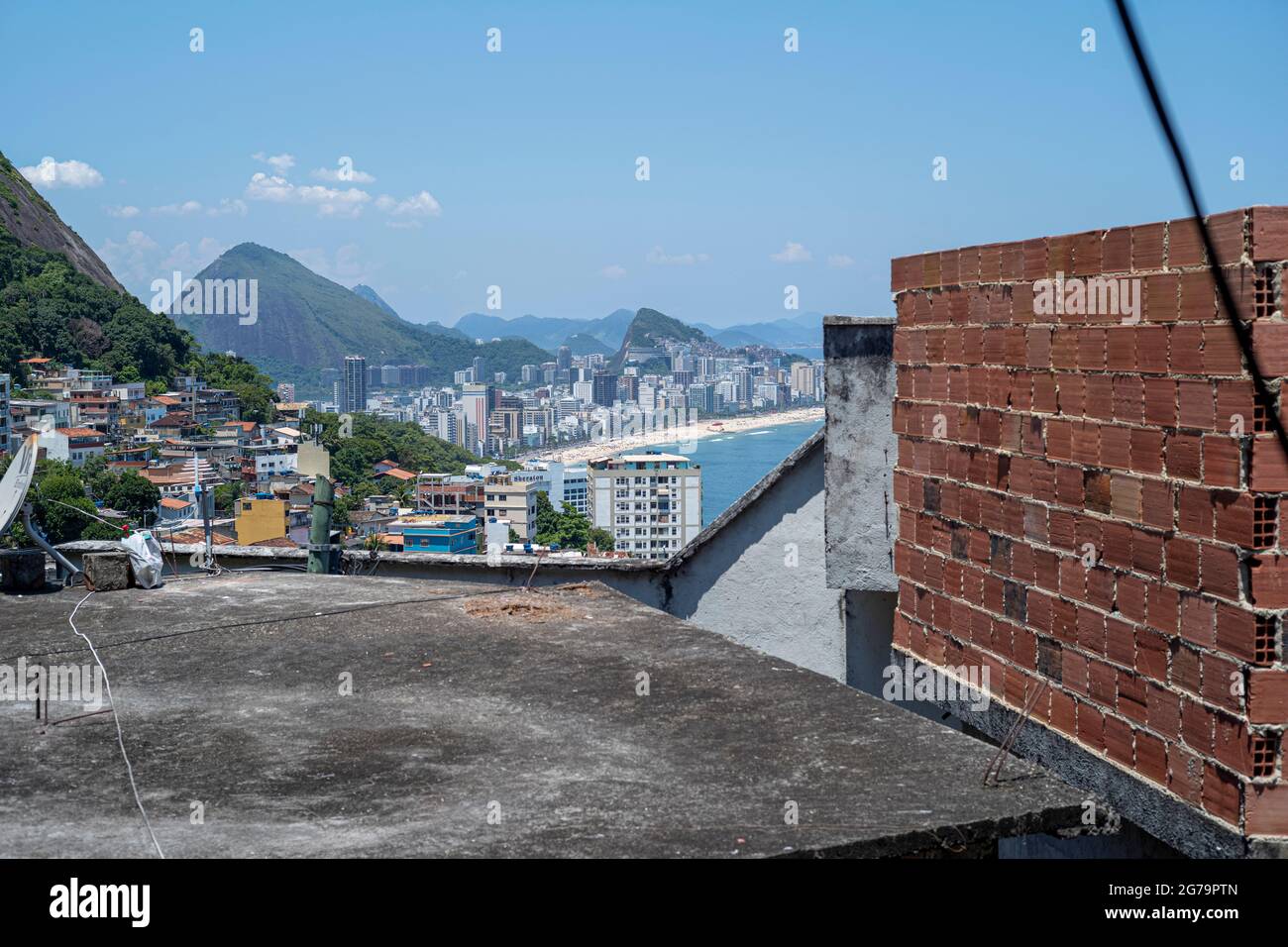 Aerial view of Ipanema and Leblon Beach and Vidigal Favela. Contrast ...