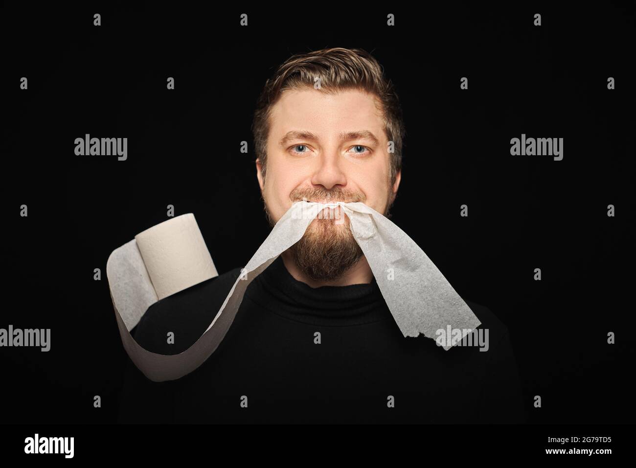 Man eating toilet paper. Funny hunger man, fasting concept. Hunger ...