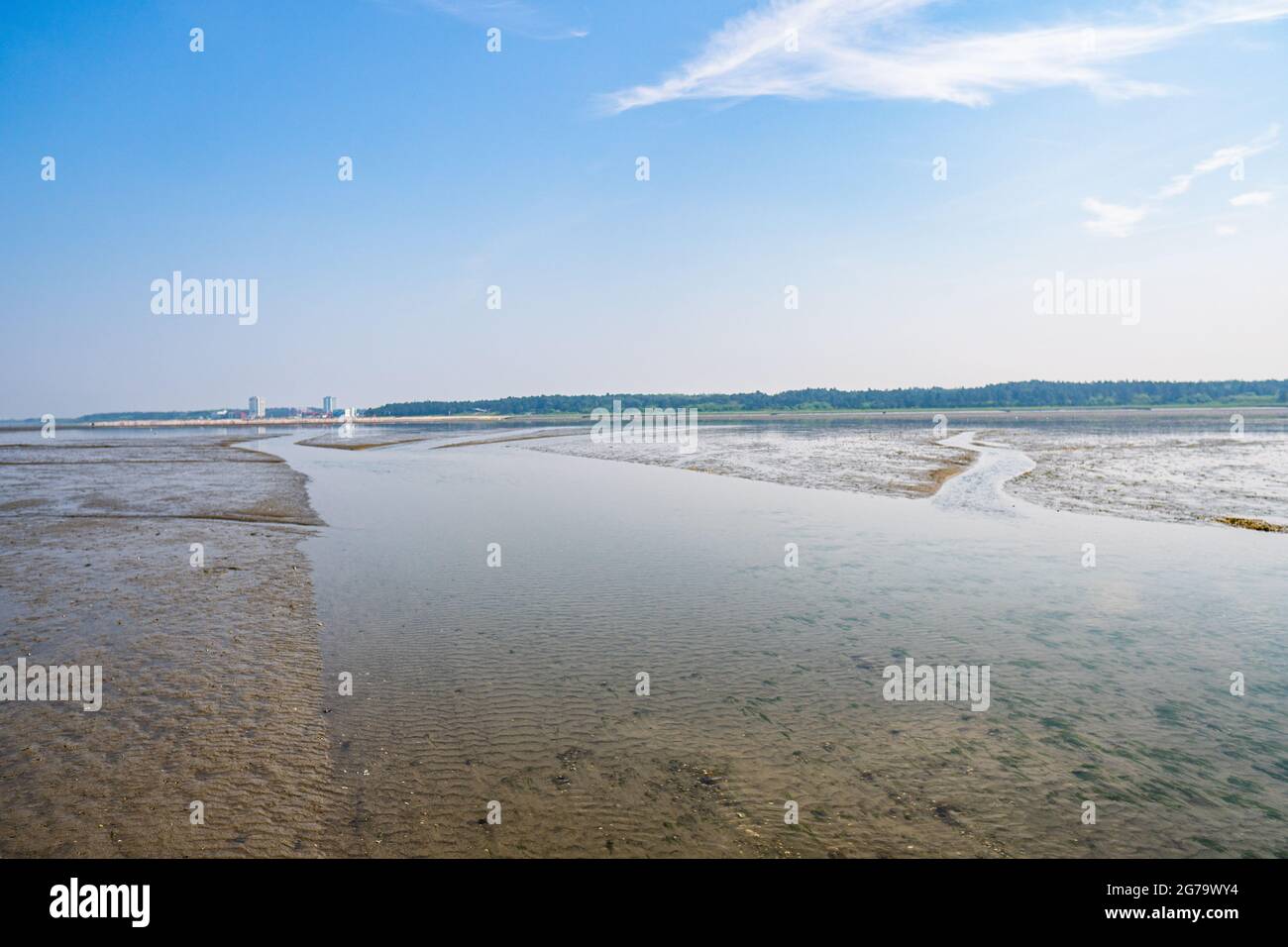 big river floating through the mudflat of the north sea at sahlenburg ...
